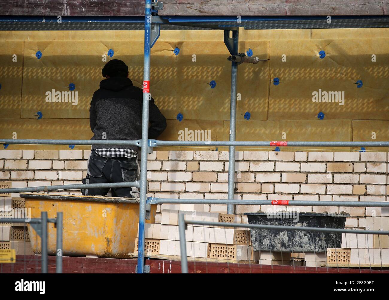 Cologne, Germany. 14th Apr, 2021. A construction worker works on the ...