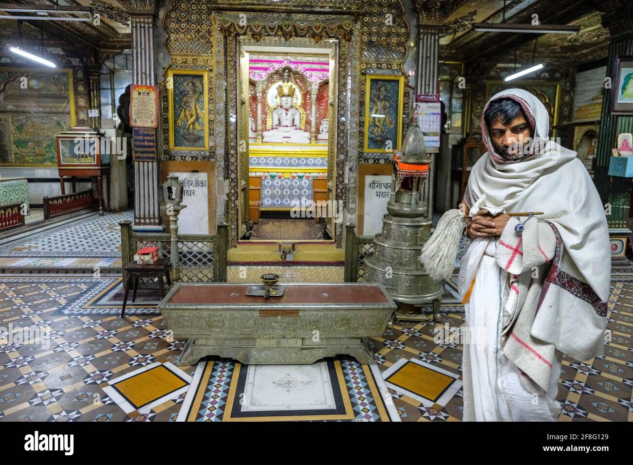 Indore, India - March 2021: A monk praying inside a Jain temple in ...