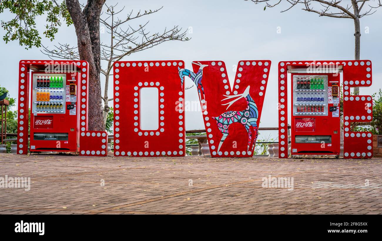 Sanya China , 24 March 2021 : Coca-Cola vending machine inside a red ...