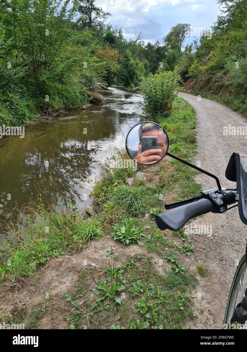 Cyclist photographed with smartphone. Caucasian man without bicycle ...
