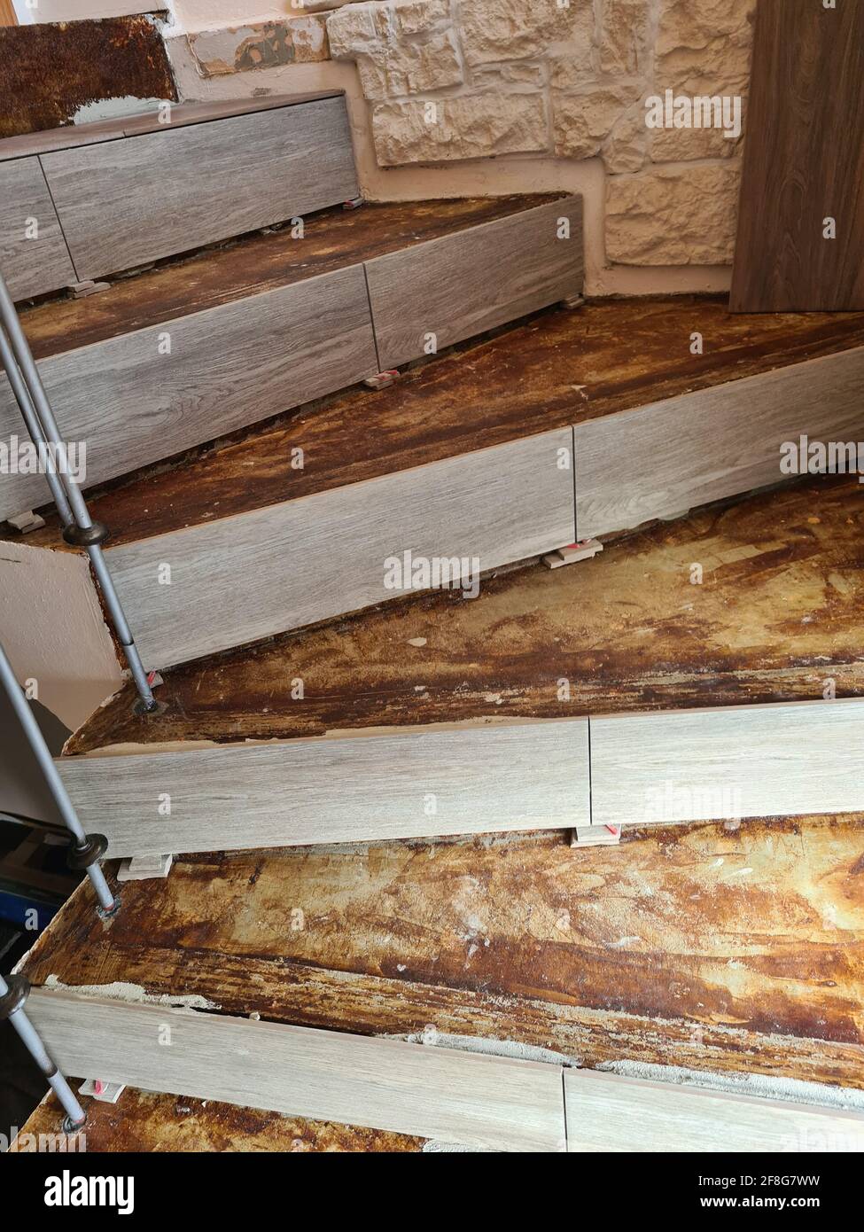 Restore stairs, rebuild with tiles, adjust clinker, lay Stock Photo - Alamy