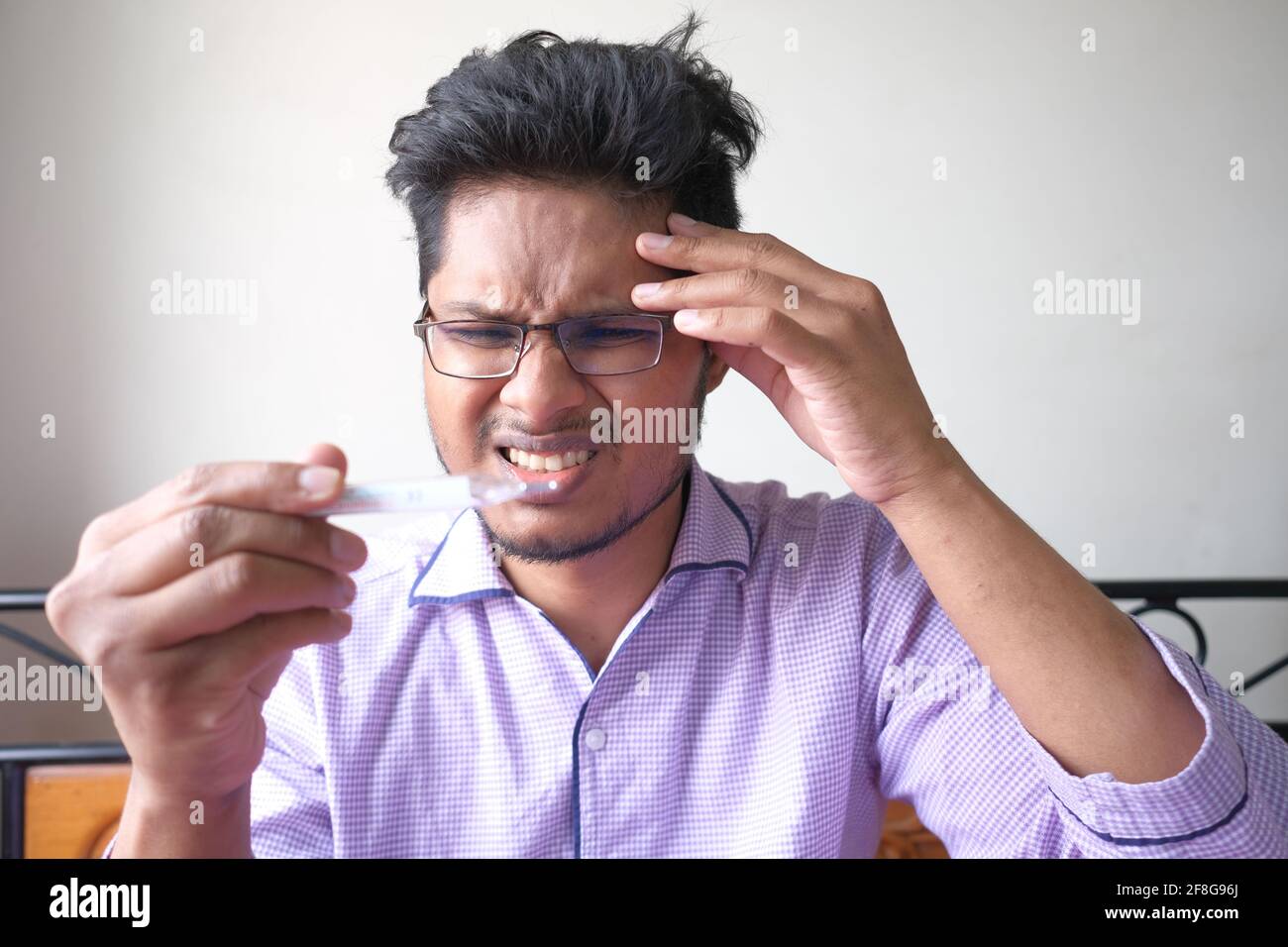 Medical thermometer for measuring body temperature in the hand Stock ...