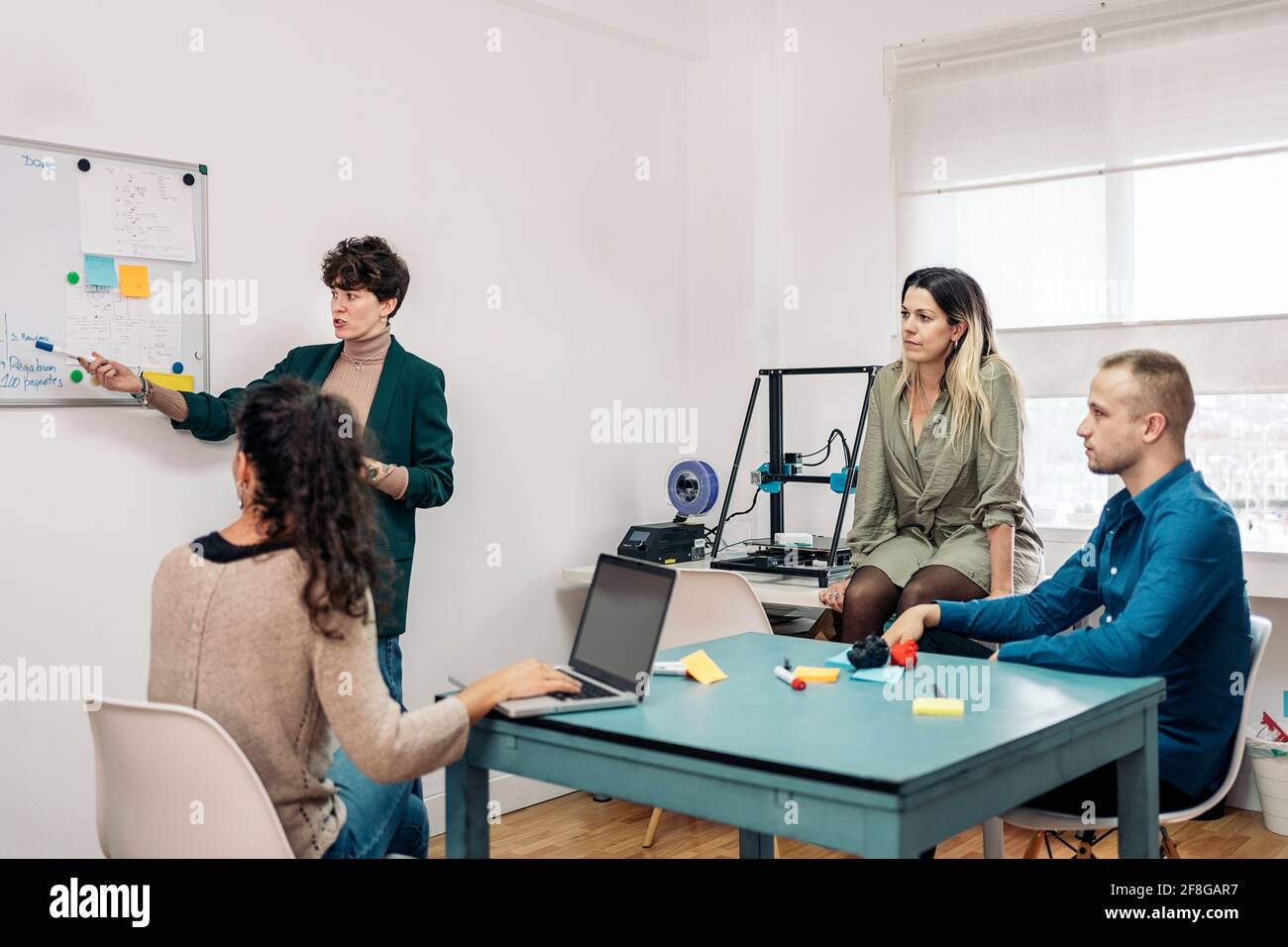 Stock photo of business people during meeting in 3d printing business ...
