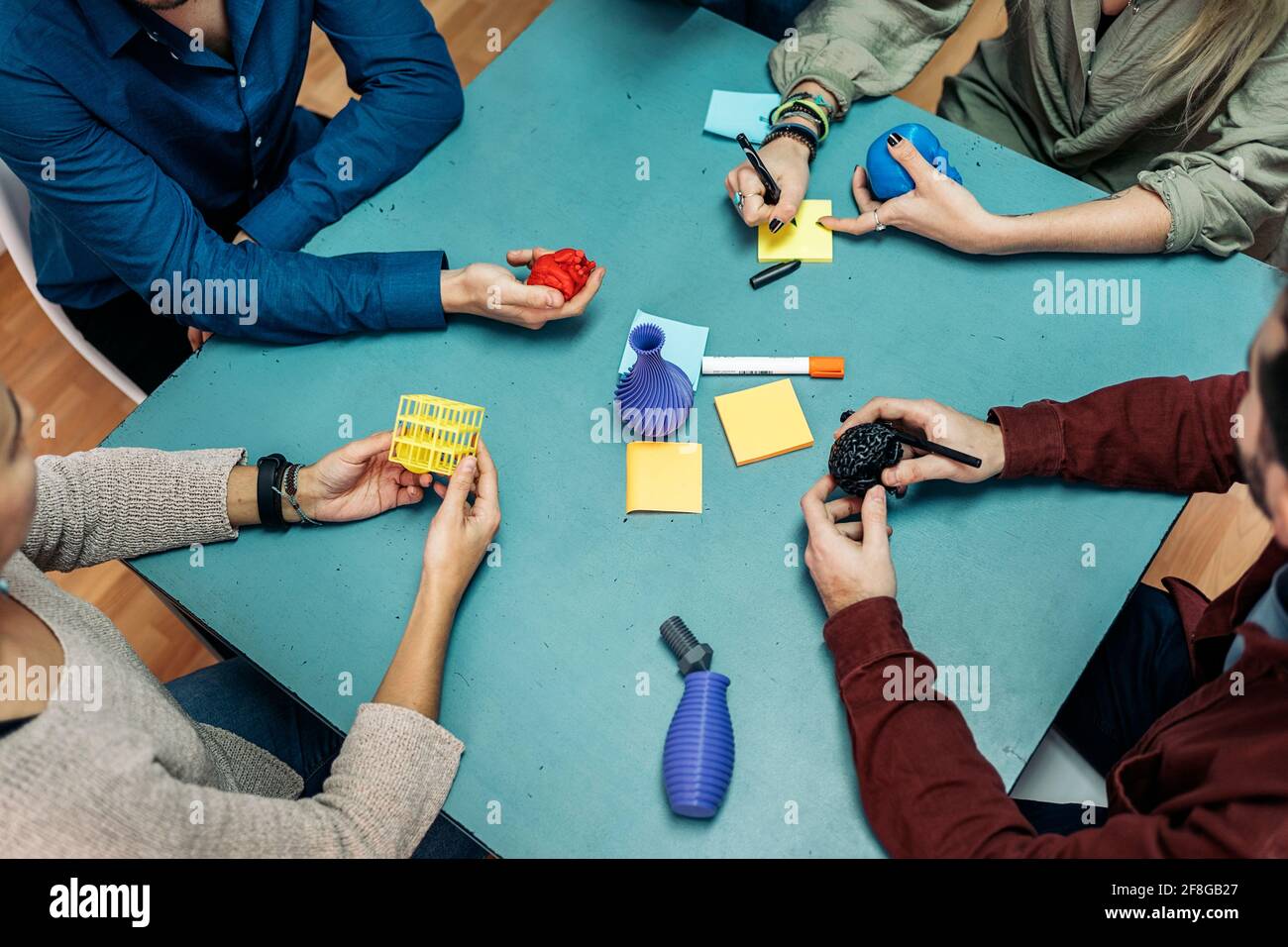 Stock photo of business people during meeting in 3d printing business ...