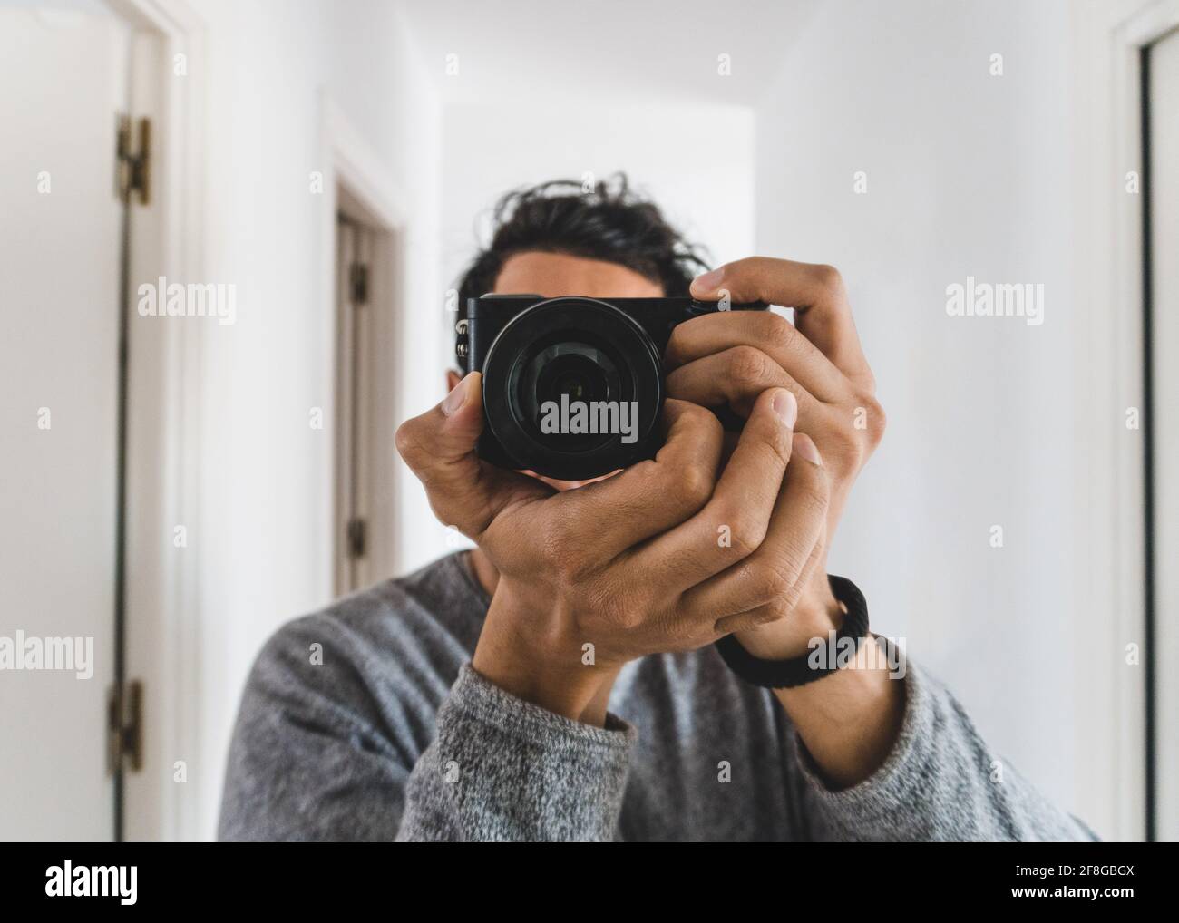 Young man photographer making hi-res stock photography and images - Alamy
