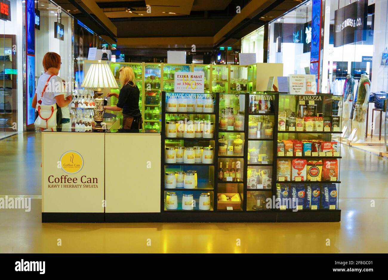 POZNAN, POLAND - Jun 06, 2016: Woman buying coffee at a stand in the ...