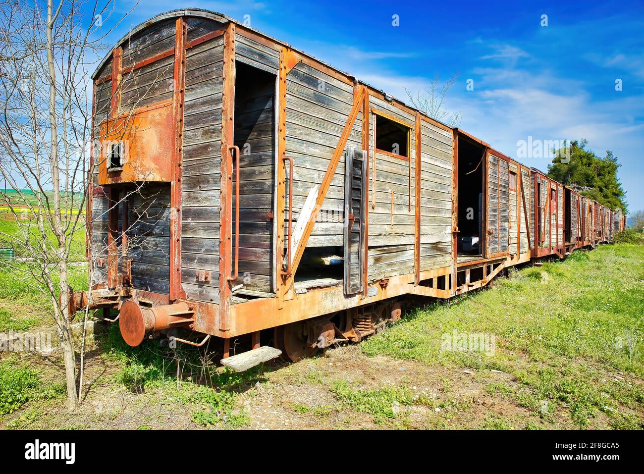 old wagon, train wagon at an old station on the rails Stock Photo - Alamy