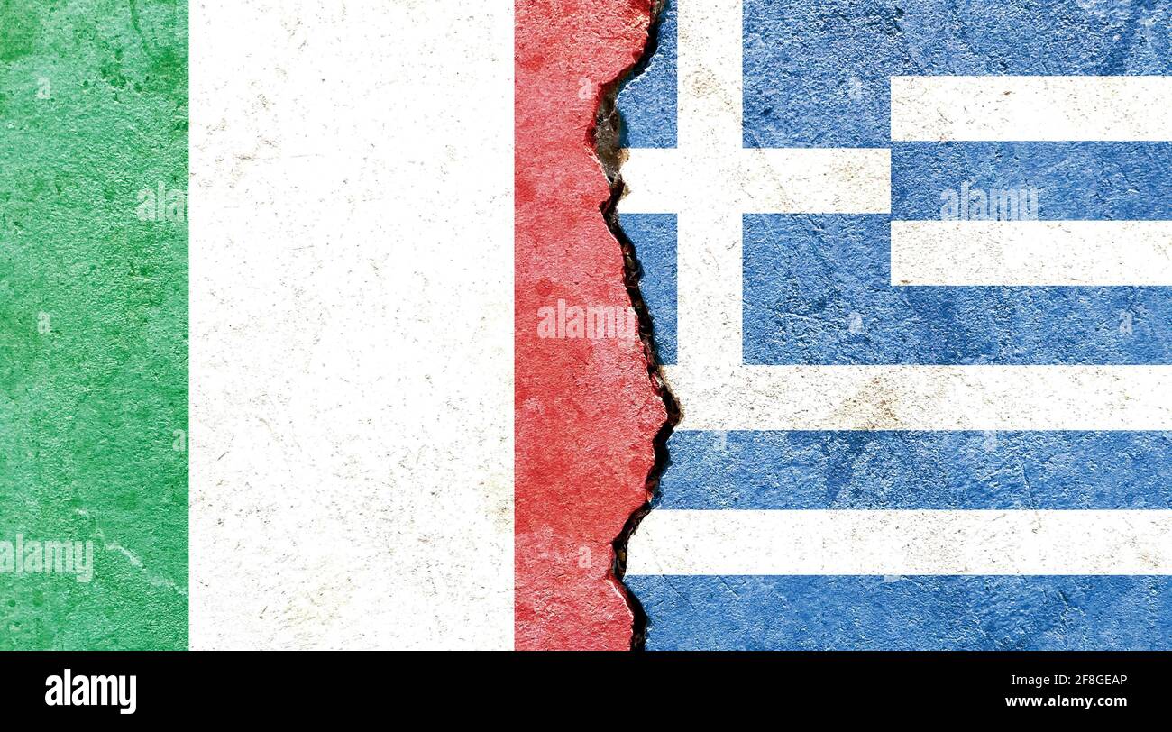 Grunge backdrop with Italy and Greece flags divided with a crack on a ...