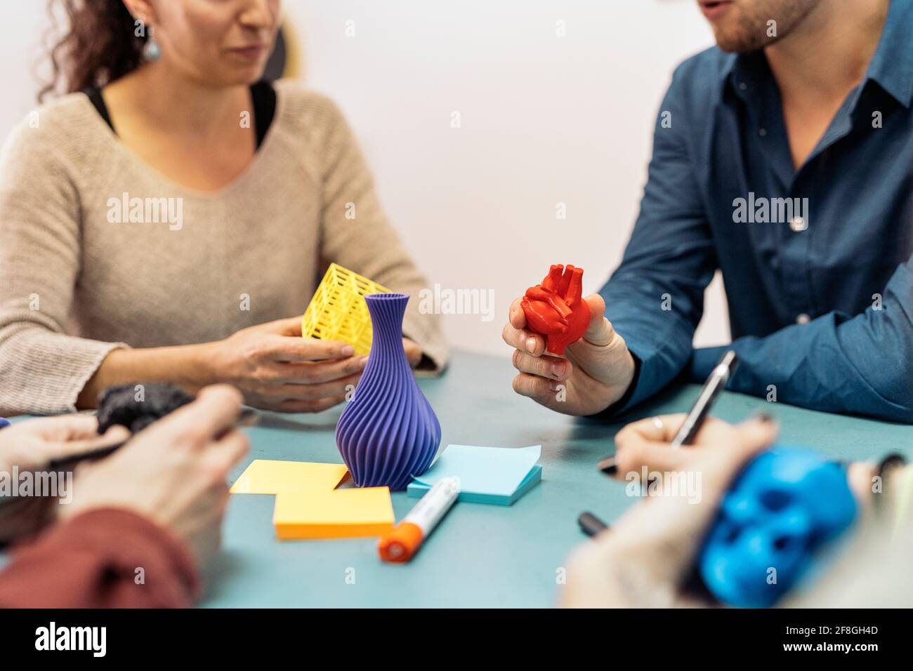 Stock photo of business people during meeting in 3d printing business ...