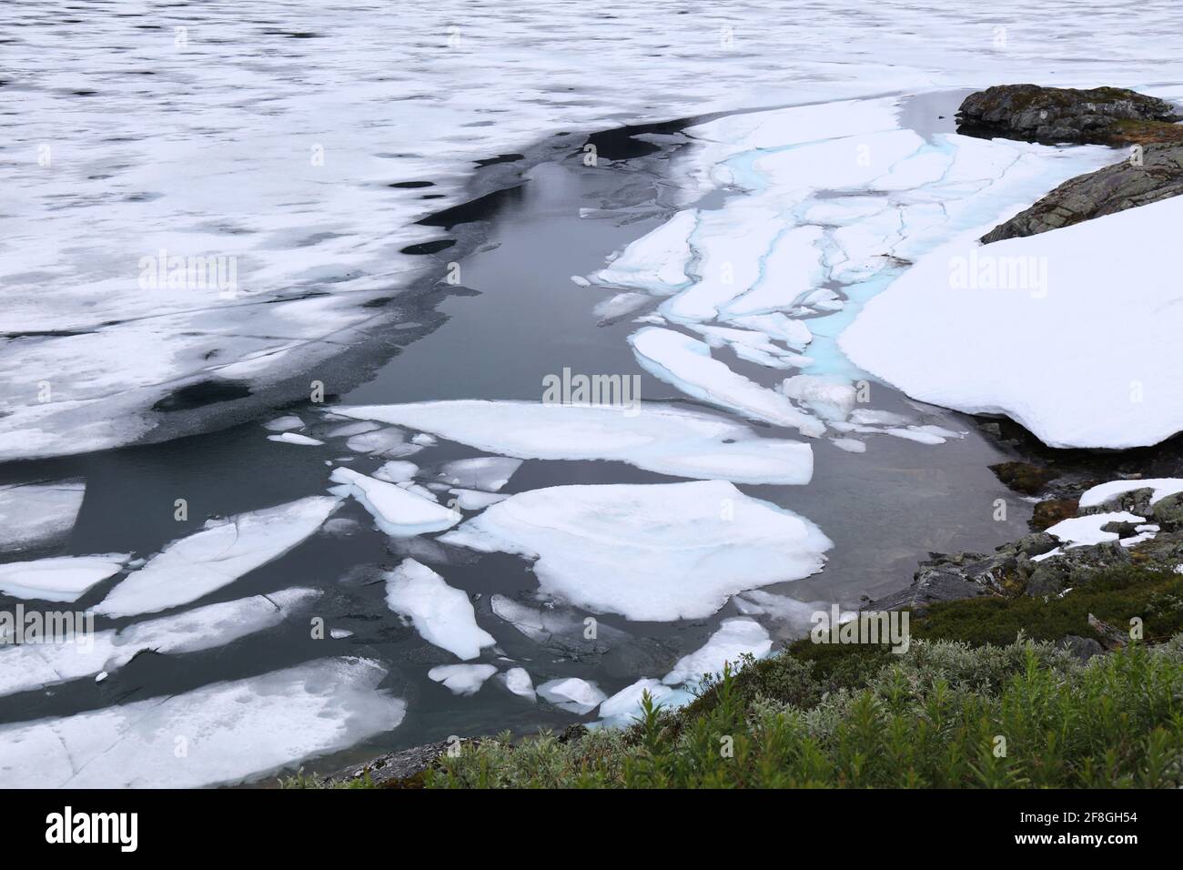 Lake ice in summer in Norway. Djupvatnet lake near Geiranger Stock ...