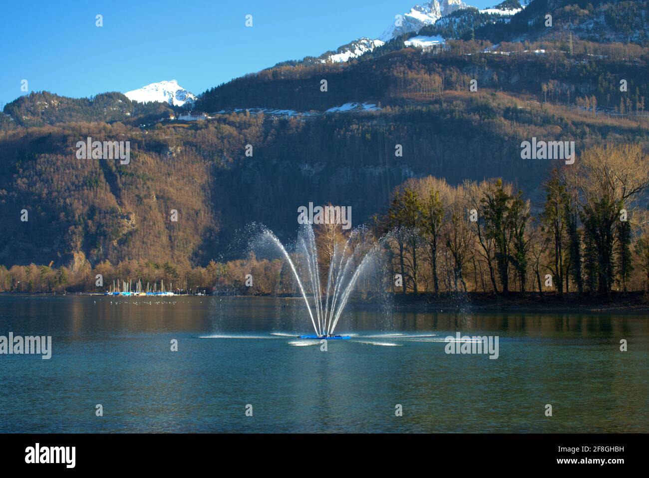 Bay of weesen at the walensee with fountain hi-res stock photography ...
