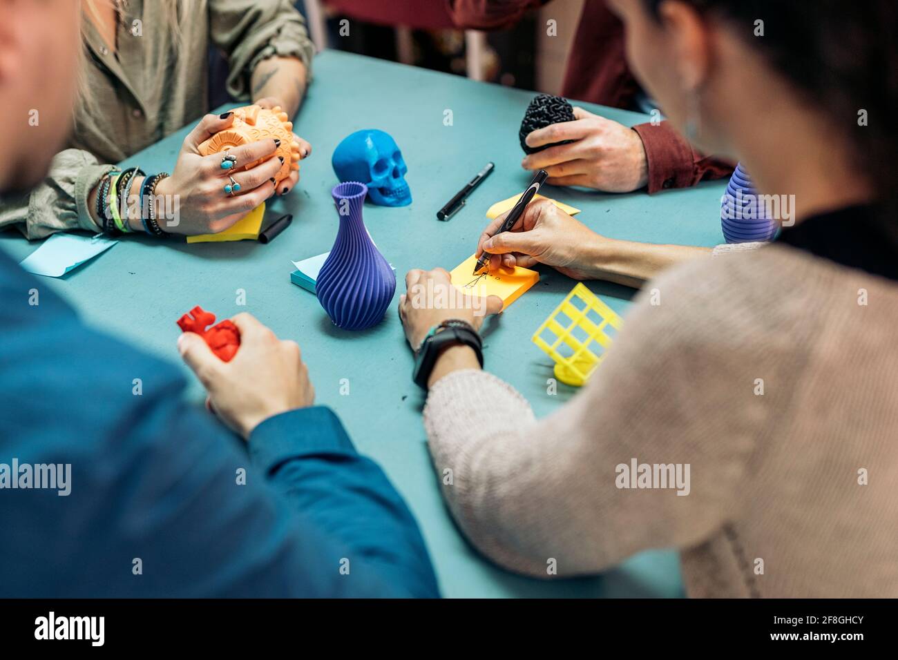 Stock photo of business people during meeting in 3d printing business ...