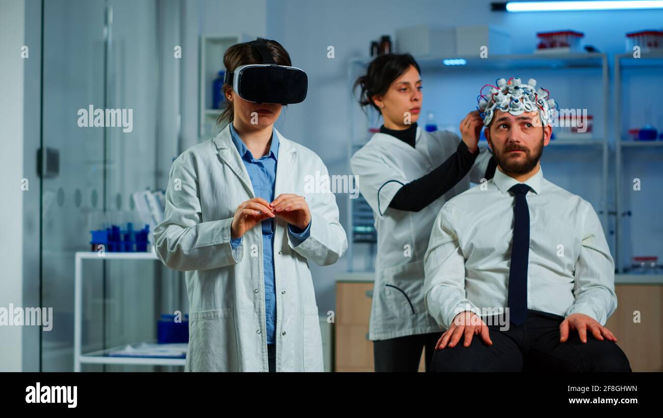 Neurological scientist using medical inovation hi-res stock photography ...