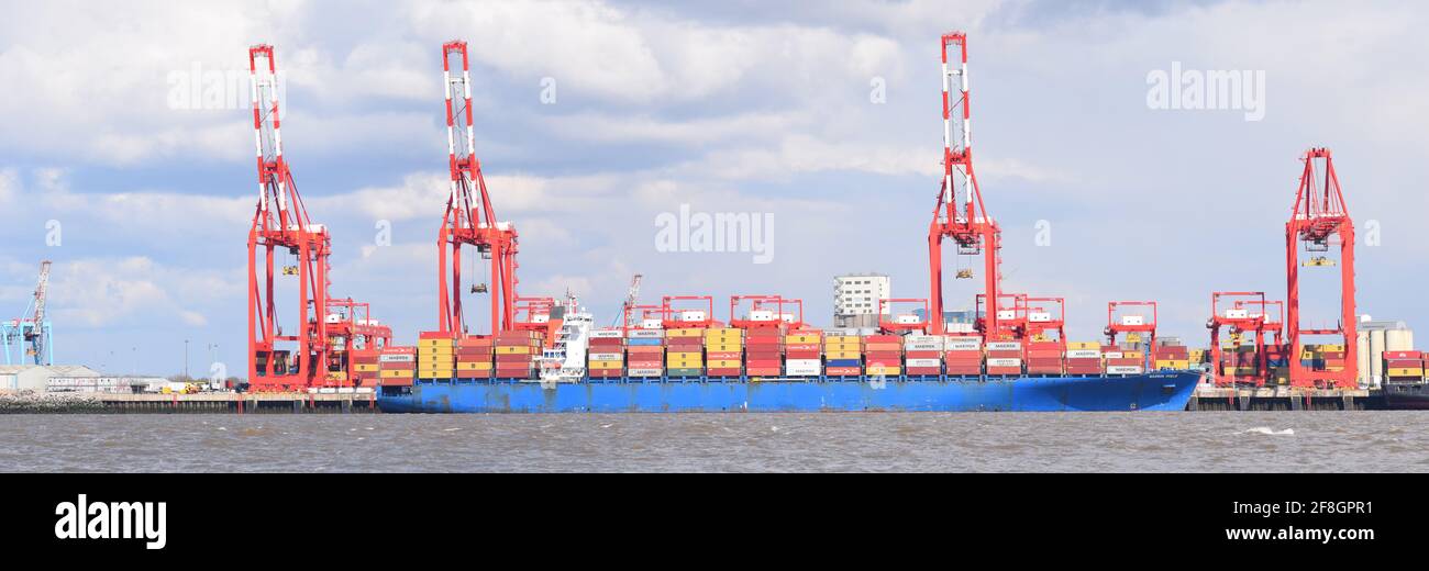 LIVERPOOL, UNITED KINGDOM - Apr 10, 2021: shipping container, cranes ...