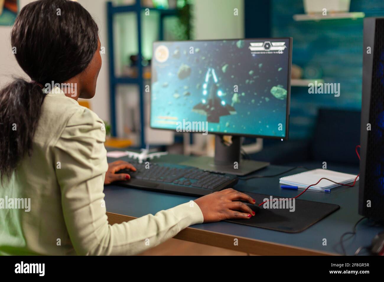 Pro e sport african professional gamer playing using powerfull pc ...