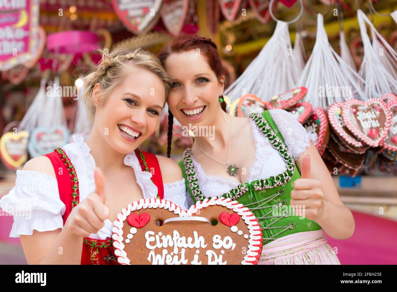 Young Women In Traditional Bavarian Clothes Dirndl Or Tracht With A