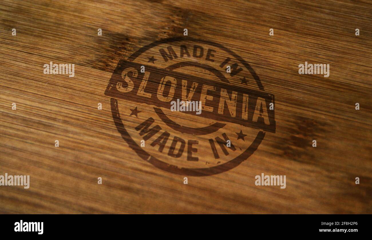 Made in Slovenia stamp printed on wooden box. Factory, manufacturing ...