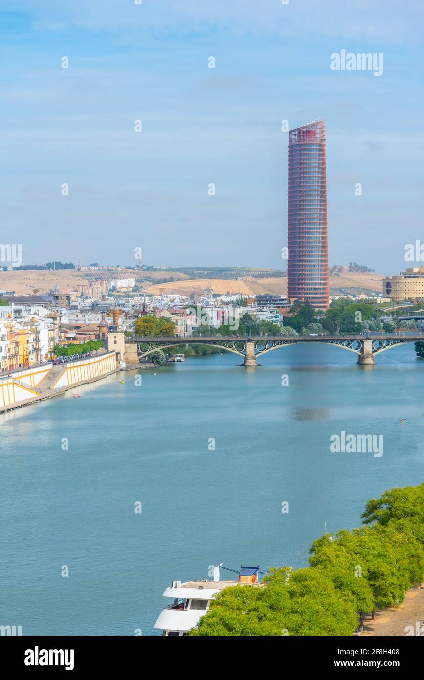 Riverside of Guadalquivir with Torre Sevilla in Spain Stock Photo - Alamy