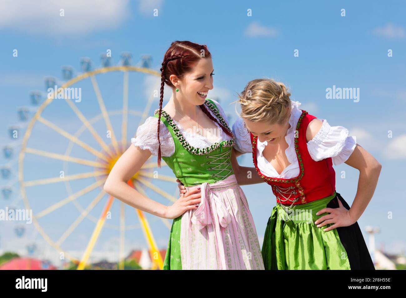 Young Women In Traditional Bavarian Clothes Dirndl Or Tracht On A