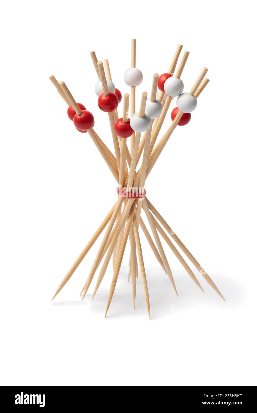 Bunch of festive red and white cocktail sticks isolated on white ...