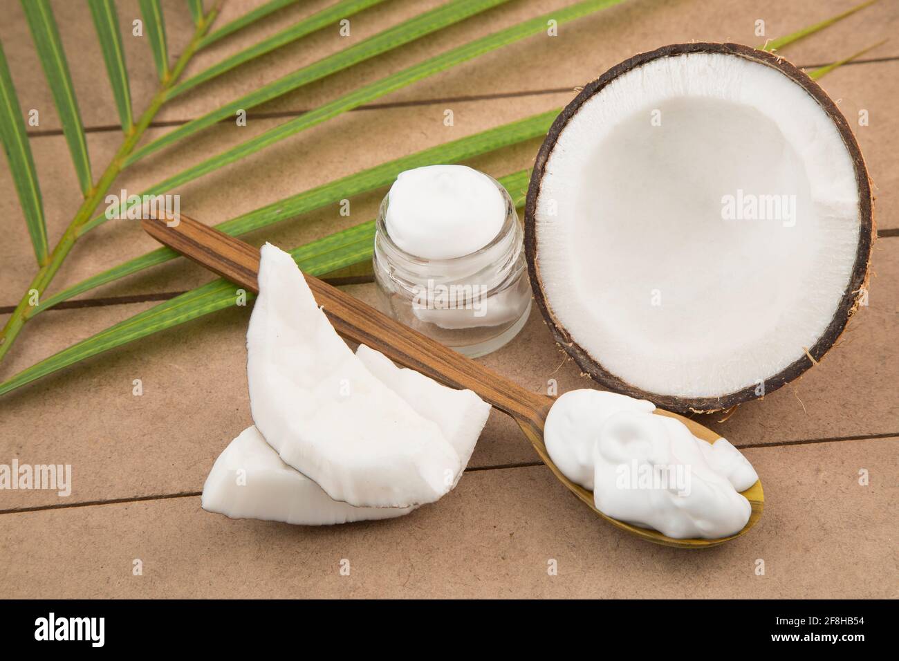organic cosmetics with coconut on wooden background Stock Photo - Alamy