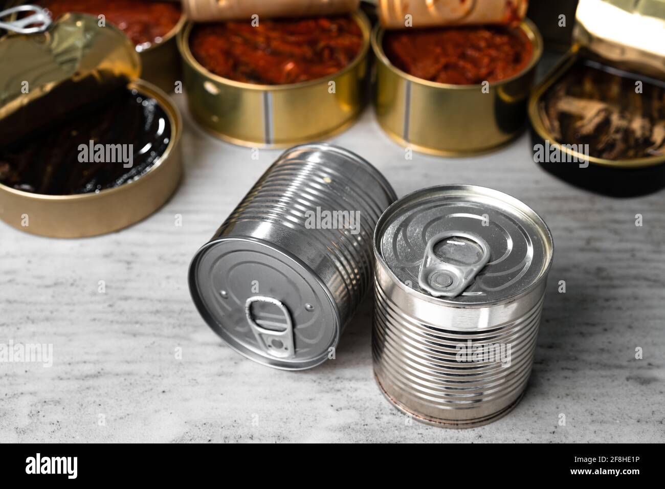 Many tin cans fish hi-res stock photography and images - Alamy