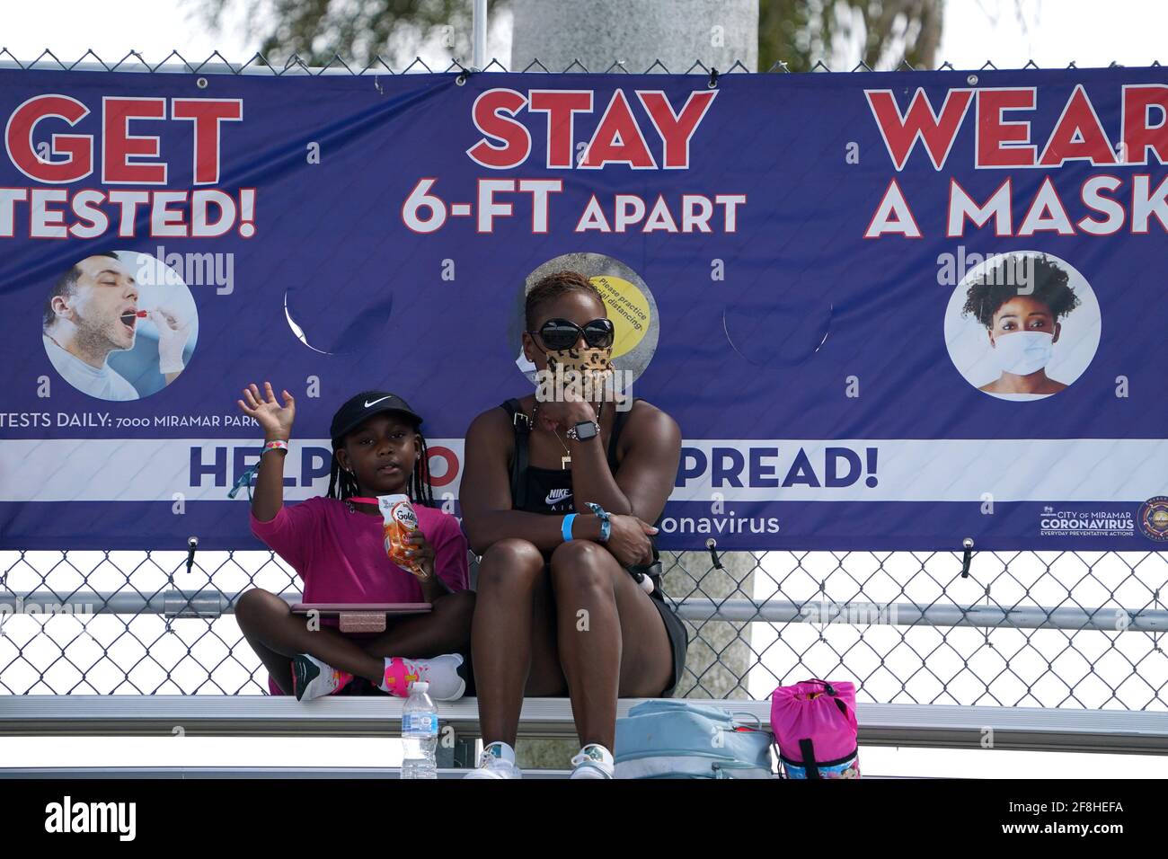 Damu-Cherry Mitchell (right) and daughter Aaleyah Mitchell sit in front ...