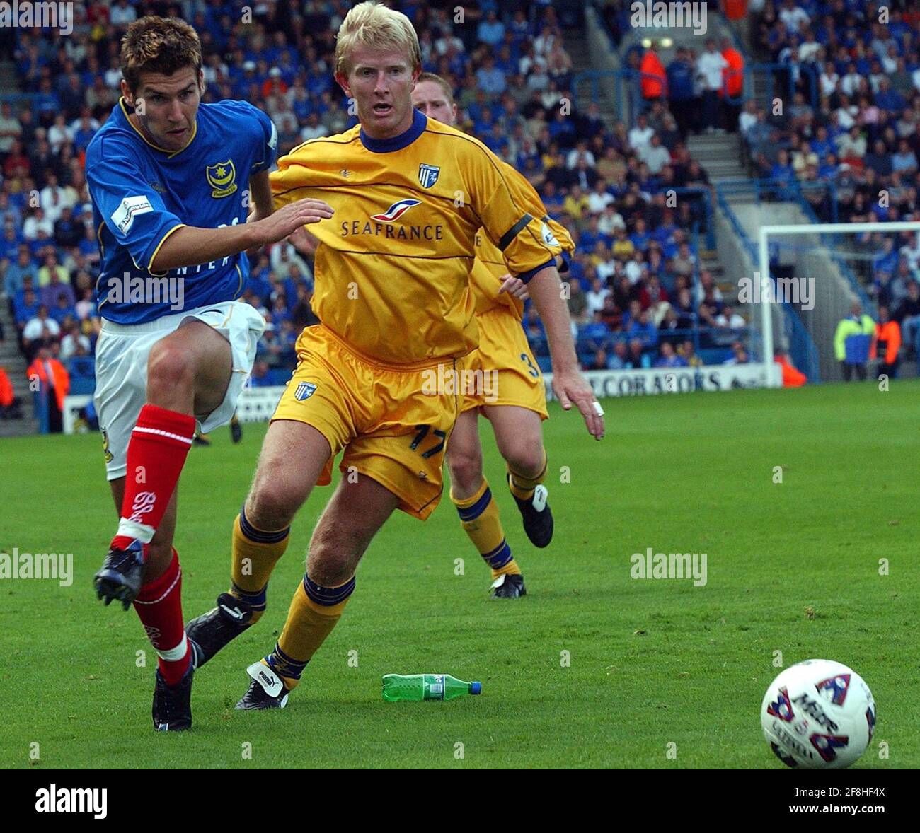 PORTSMOUTH'S MARK BURCHILL GETS IN ASHOTT UNDER PRESSURE FRIOM ...
