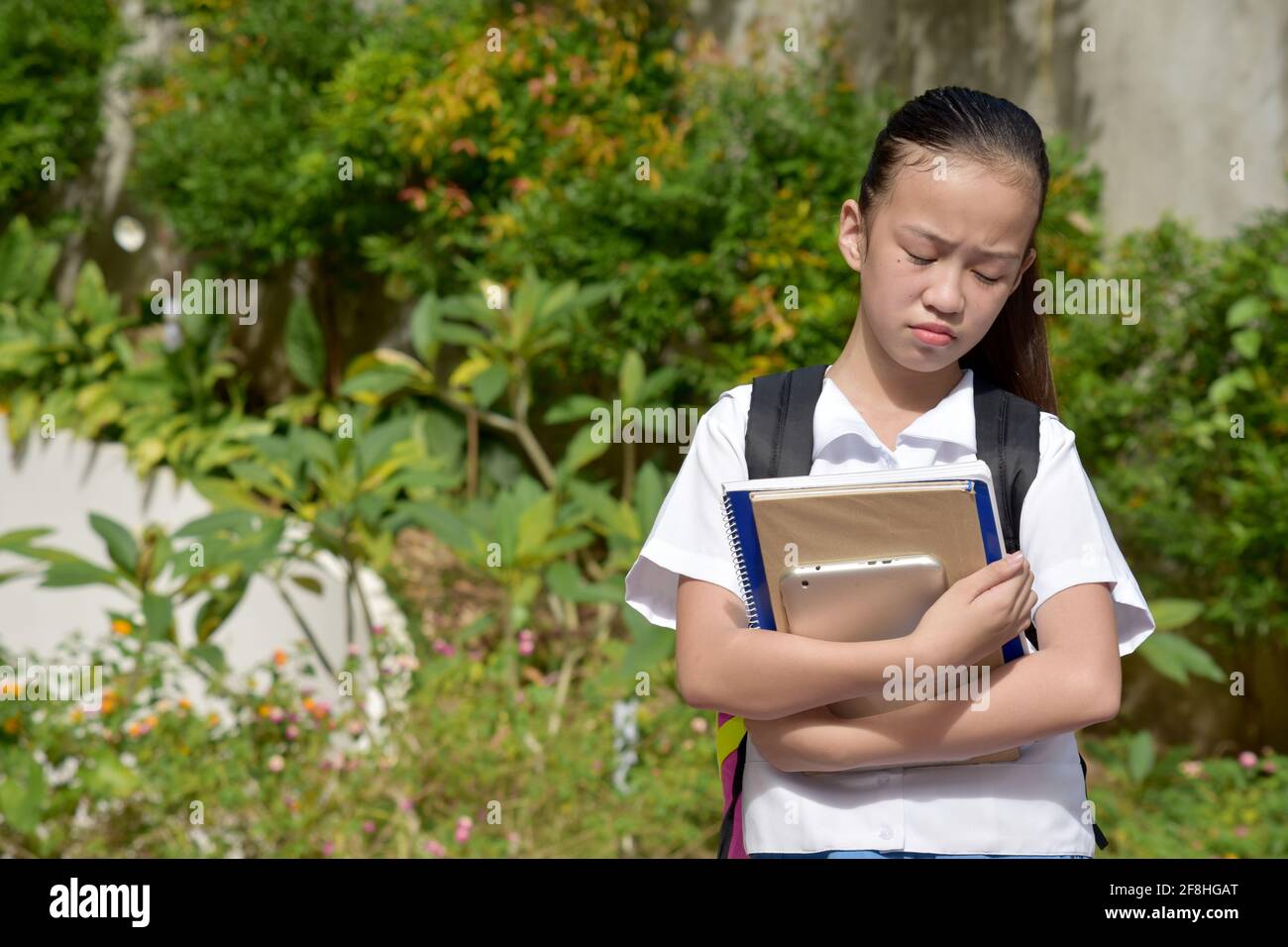Unhappy Student Teenager School Girl Wearing Uniform With Books Stock ...
