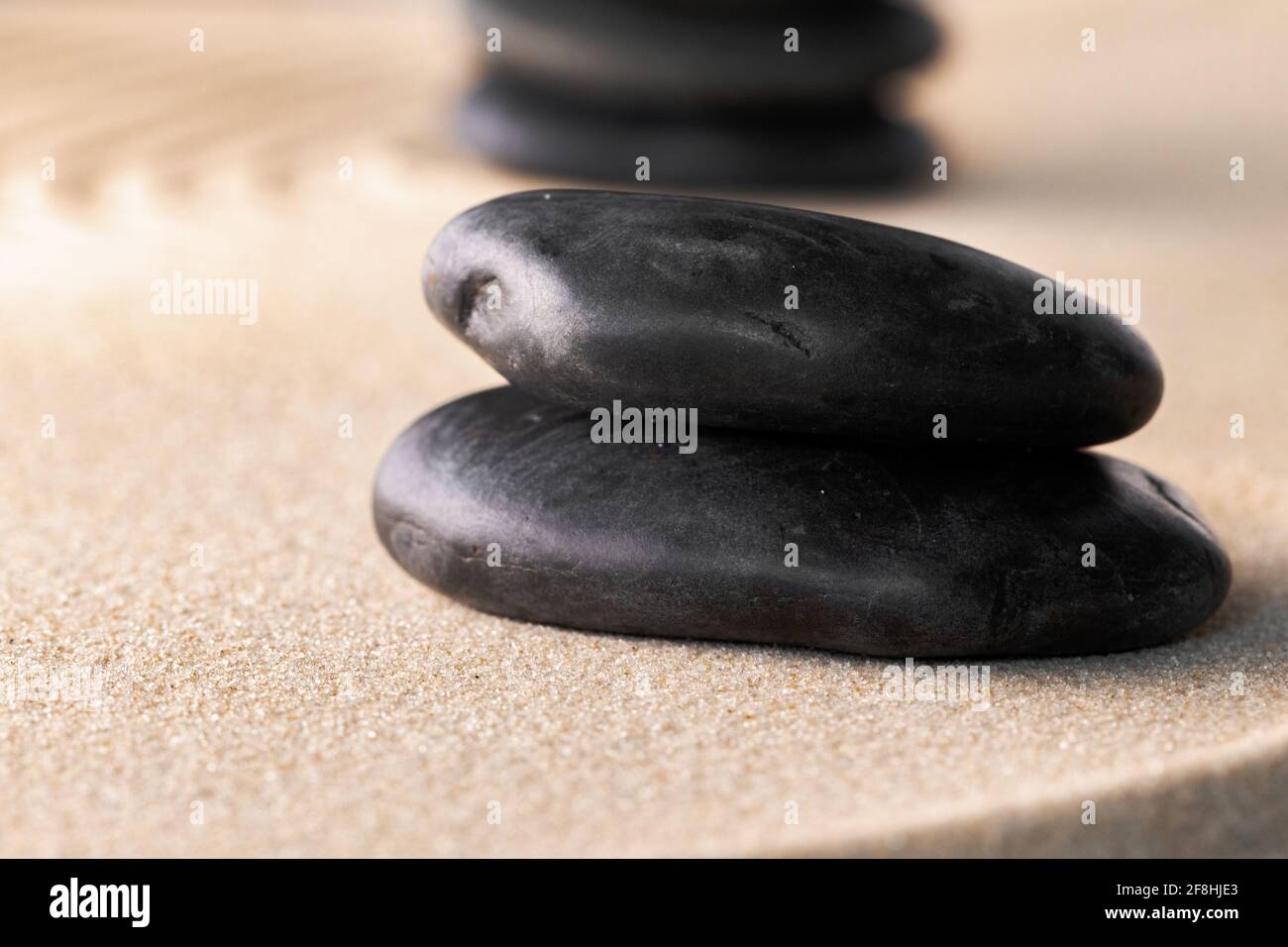 Japanese zen garden with stone in raked sand Stock Photo - Alamy