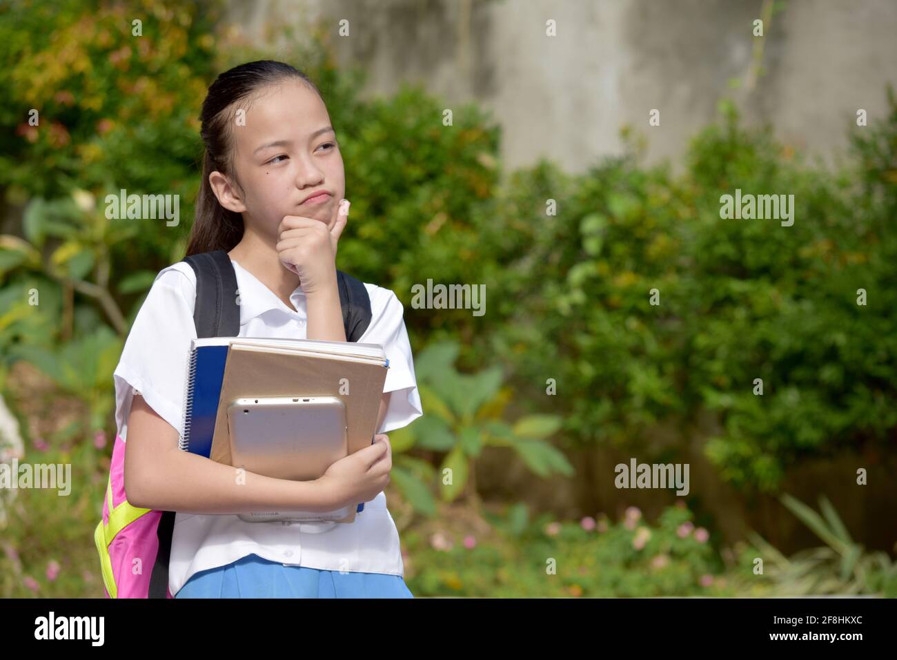 Minority Female Student Decision Making With School Books Stock Photo ...