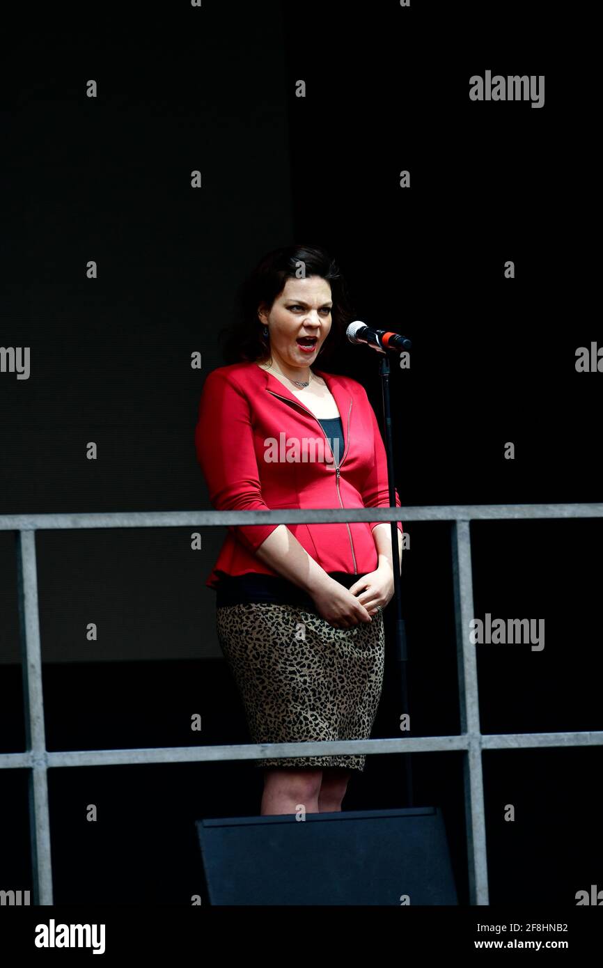 Lady Singer in red dress Stock Photo - Alamy
