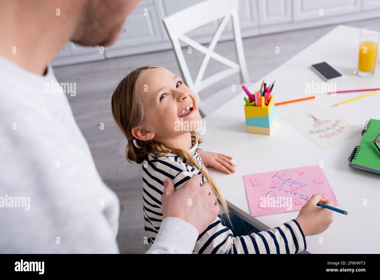 Child touching shoulder hi-res stock photography and images - Alamy