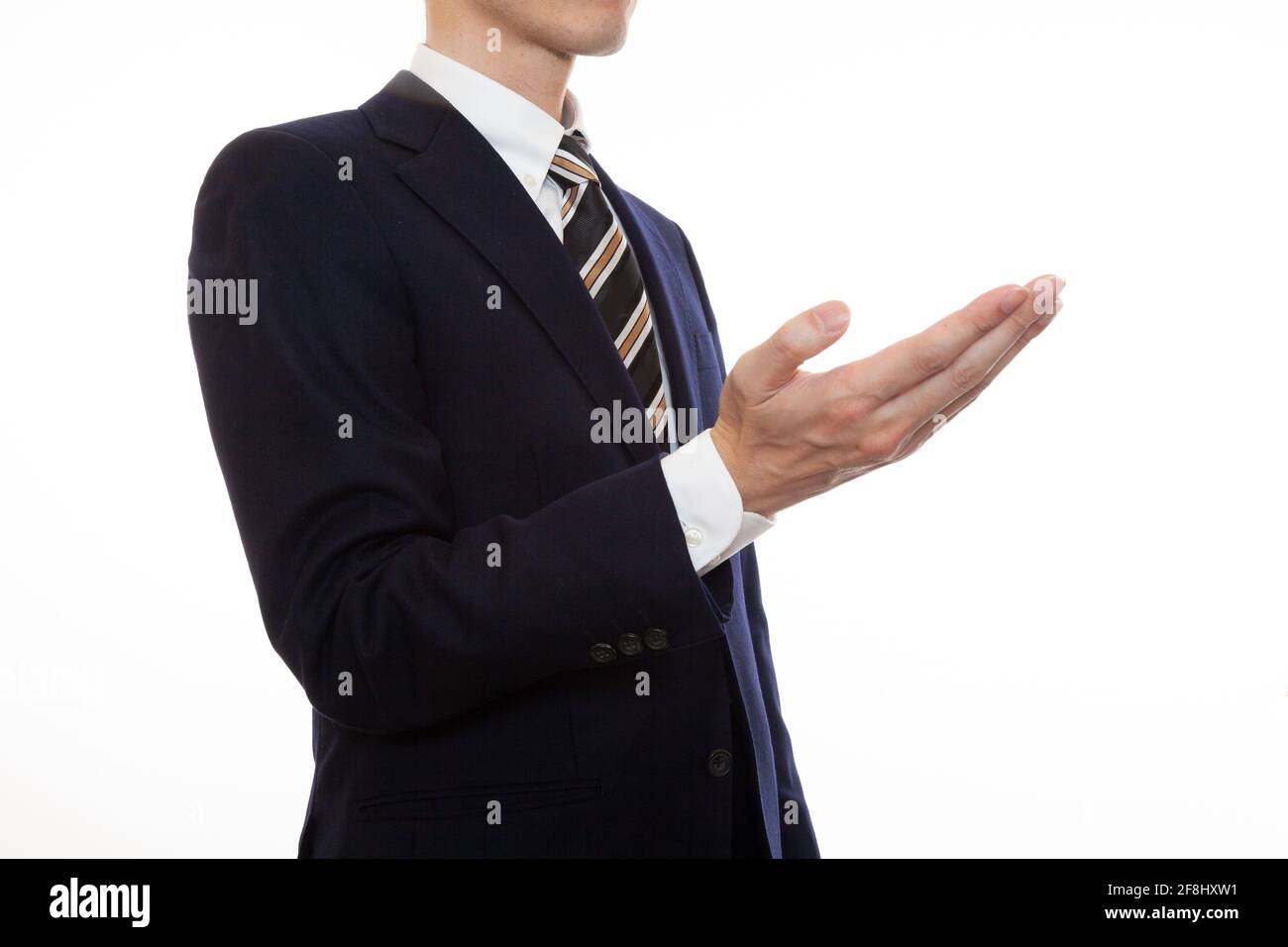 Business person to introduce and explain, upper body Stock Photo - Alamy