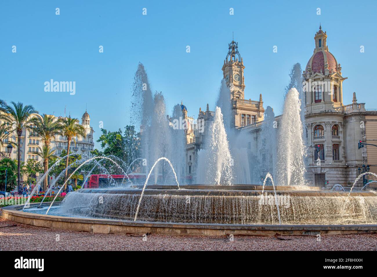 Town hall behind a fountain in Spanish town Valencia Stock Photo - Alamy