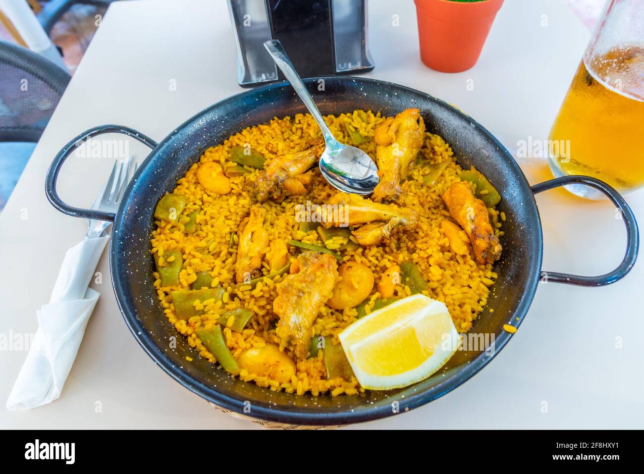 Paella Valenciana, traditional dish of Valencia region in Spain Stock ...
