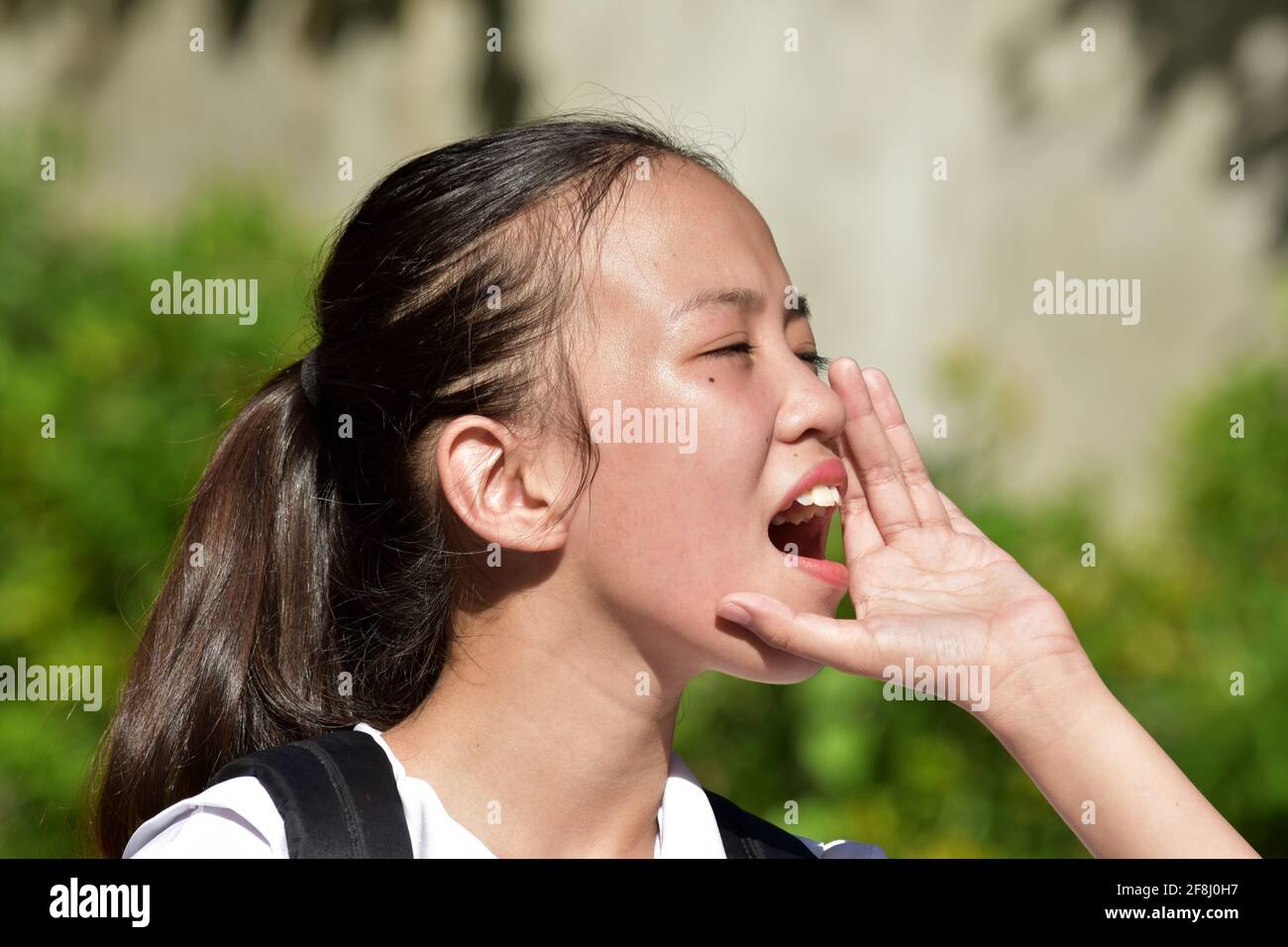 Female student yelling hi-res stock photography and images - Alamy