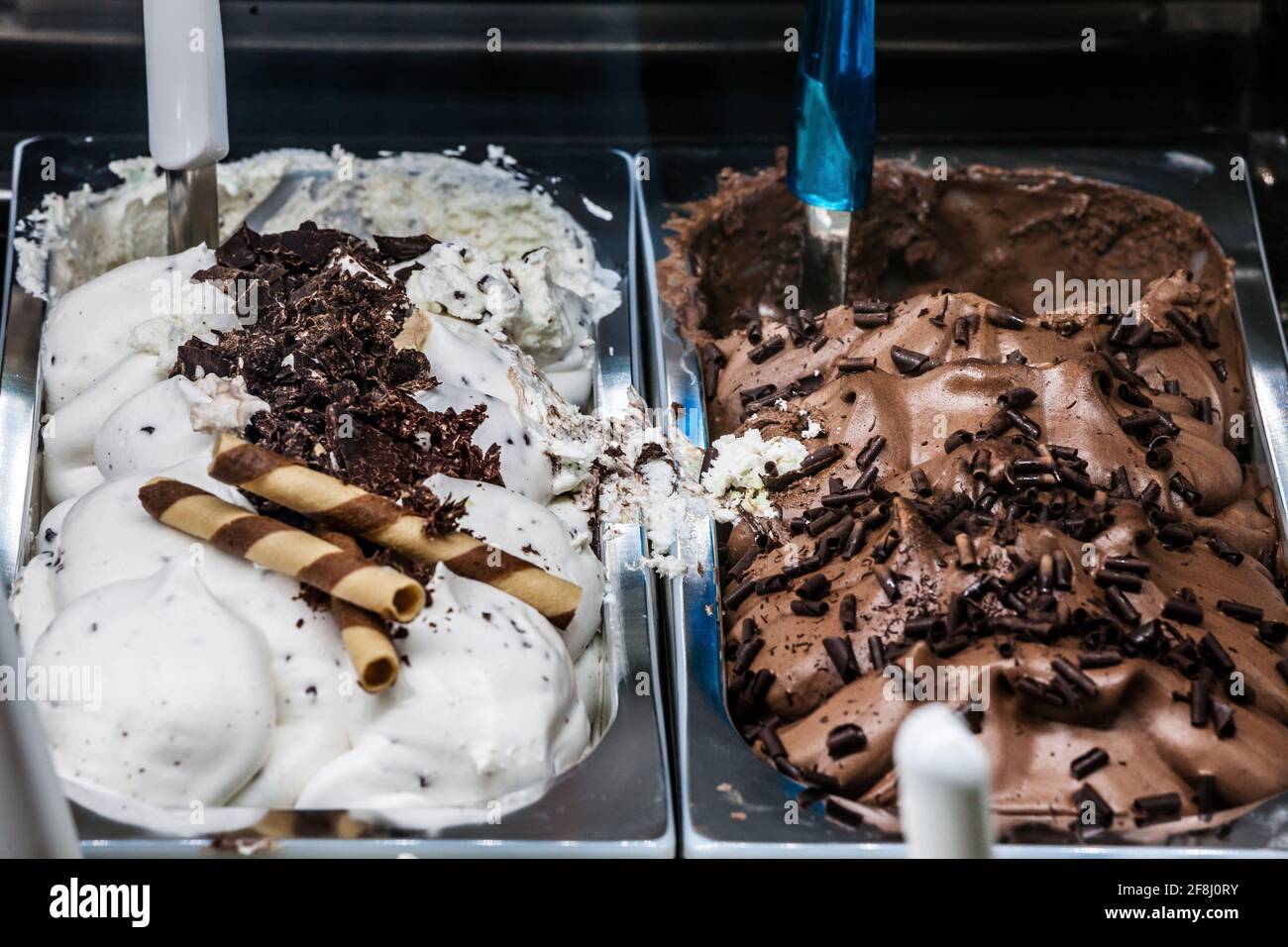 Italian ice cream. Trays with different flavors of Italian gelato ...