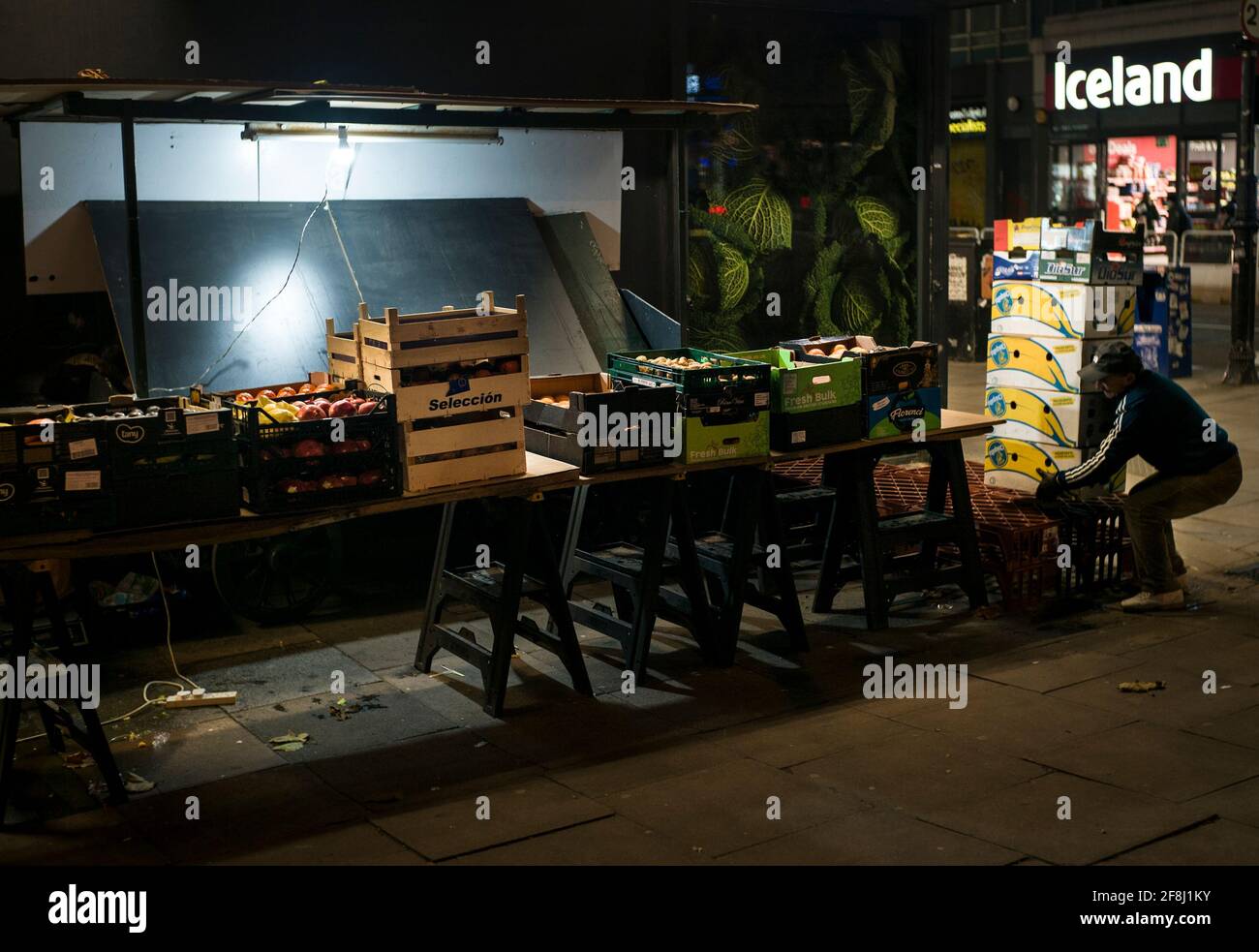 packing up at night, street vender, fruit and vegetable seller london ...