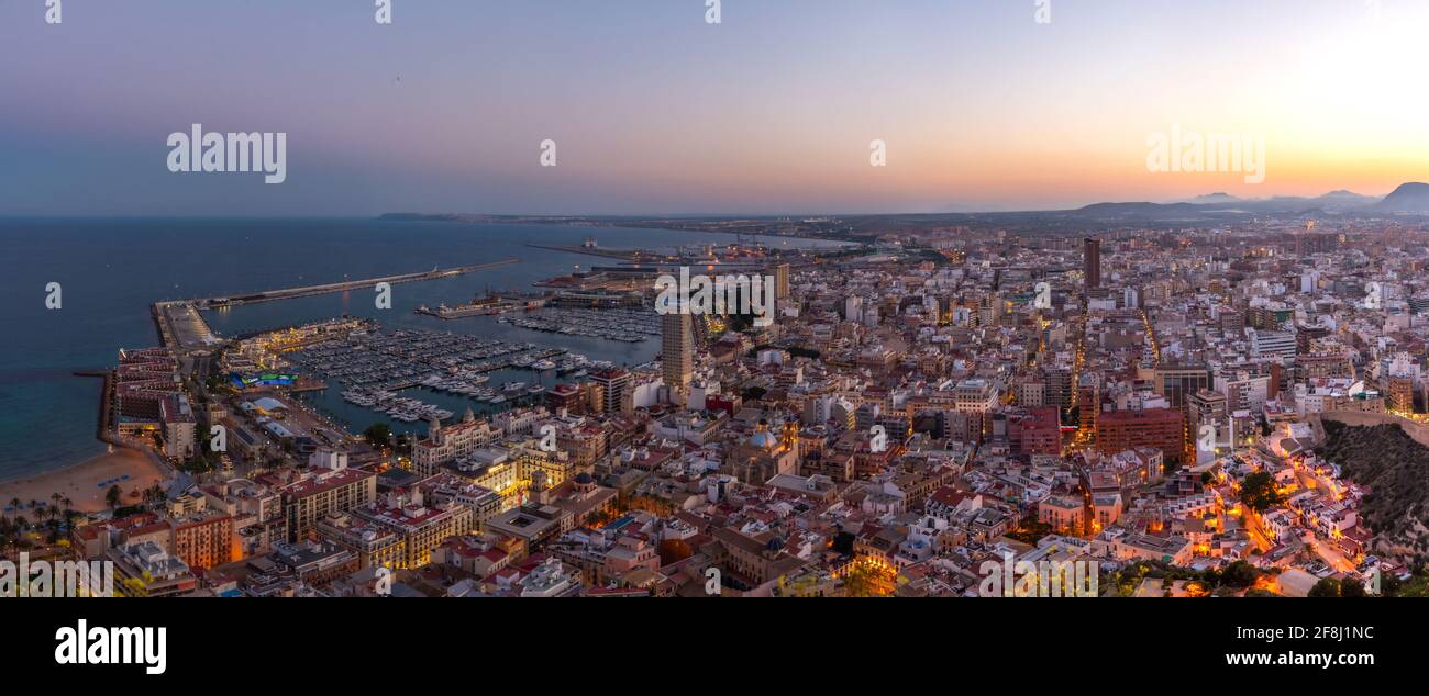 Sunset view of Spanish city and port Alicante Stock Photo - Alamy