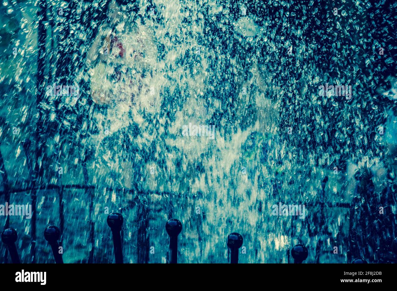 many water drops in water spray fountain Stock Photo - Alamy