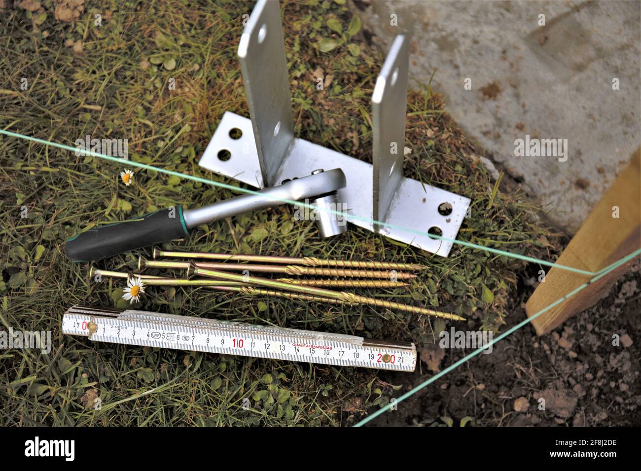 rake on the ground Stock Photo - Alamy