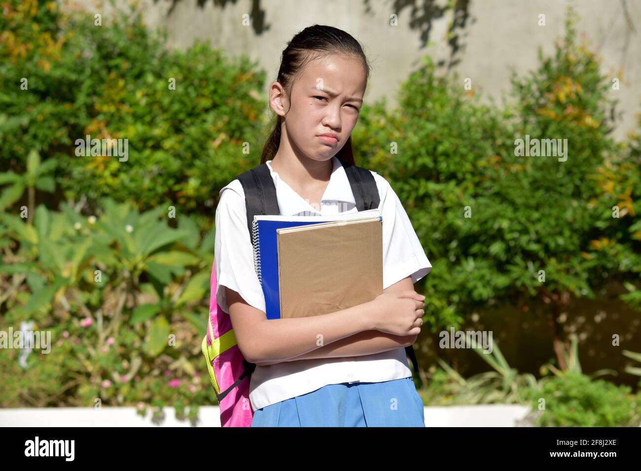 Filipina Girl Student And Depression With Books Stock Photo - Alamy