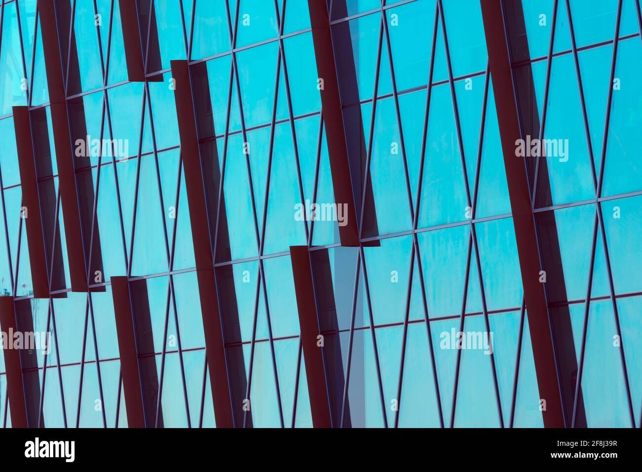 Abstract glass surface with geometric triangular shapes and dark ...