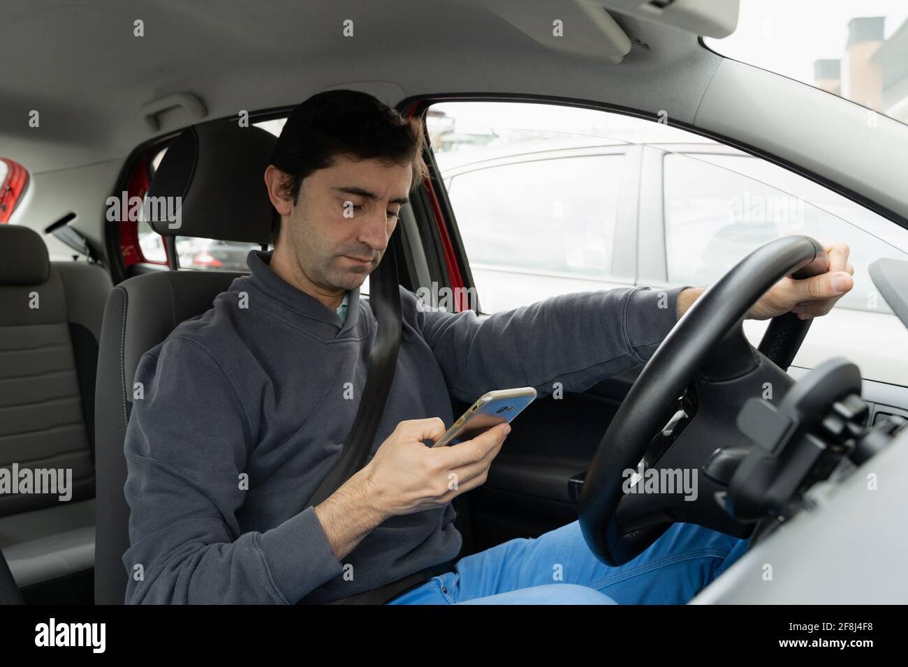 Distracted driver hi-res stock photography and images - Alamy