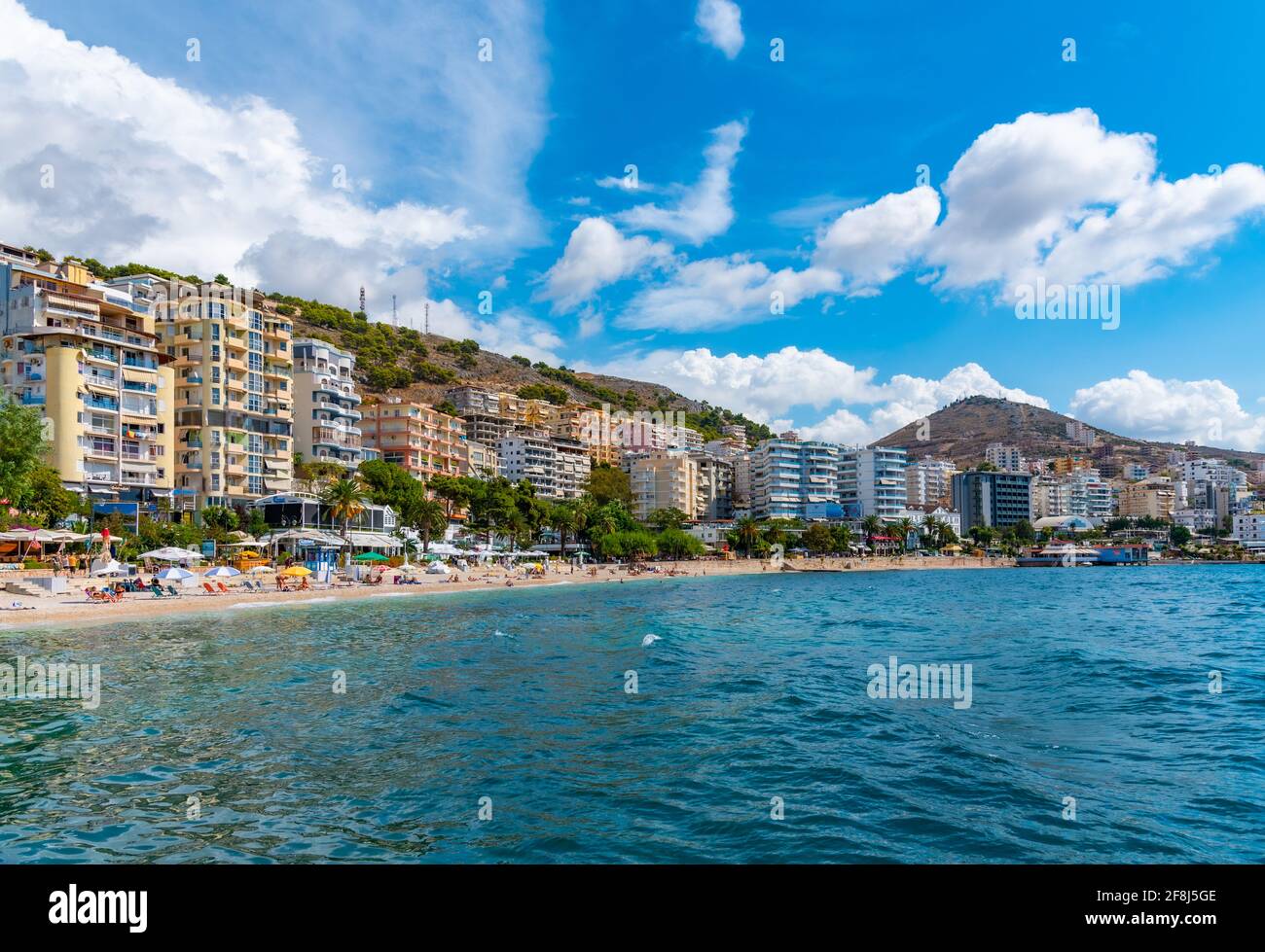 SARANDE, ALBANIA, SEPTEMBER 26, 2019: People are enjoying a sunny day ...