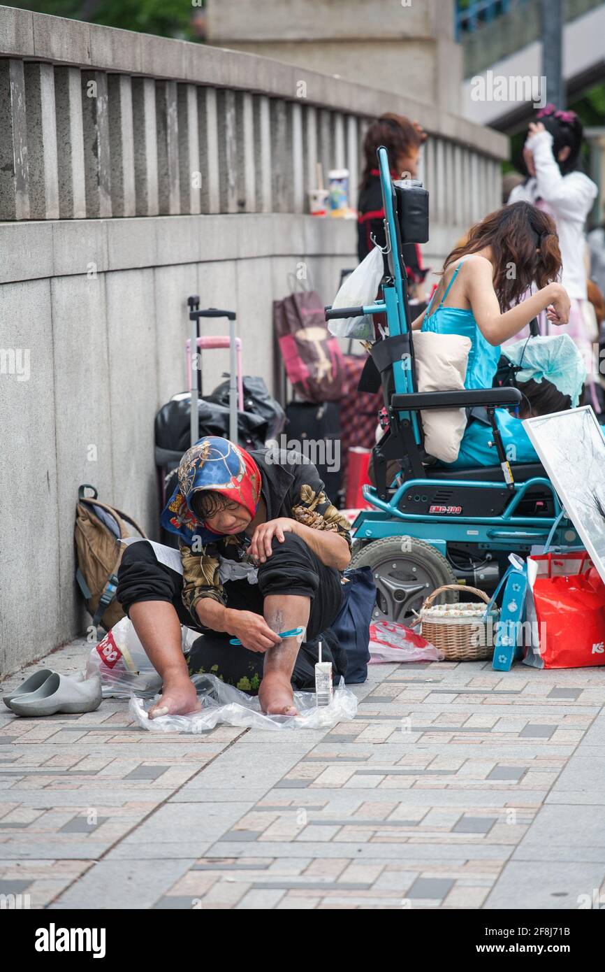 Barefoot homeless hi-res stock photography and images - Alamy
