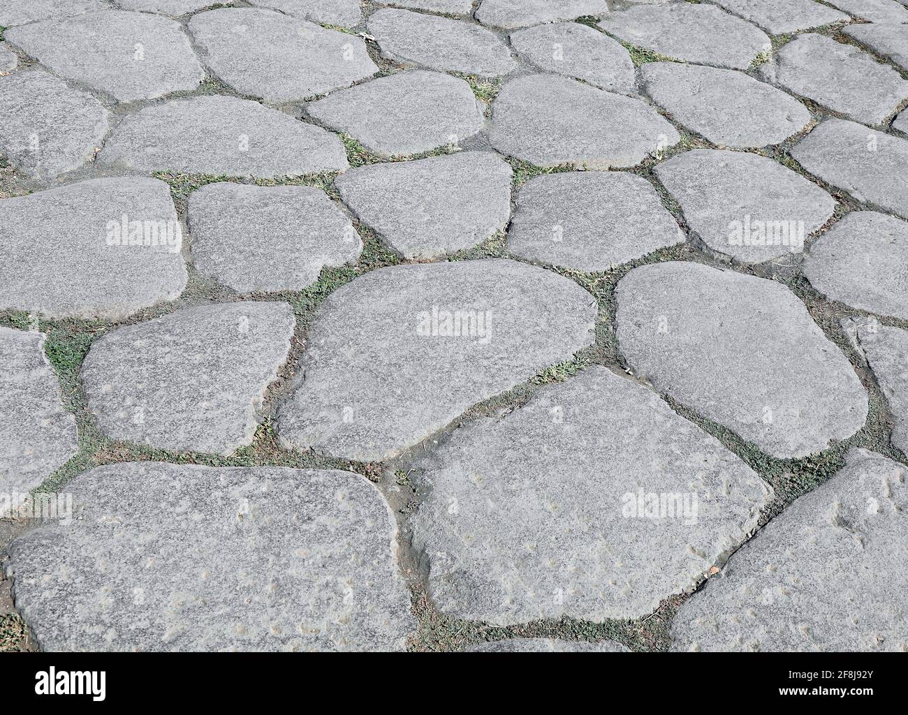 background of stones of an ancient roman road in Southern Italy Stock ...