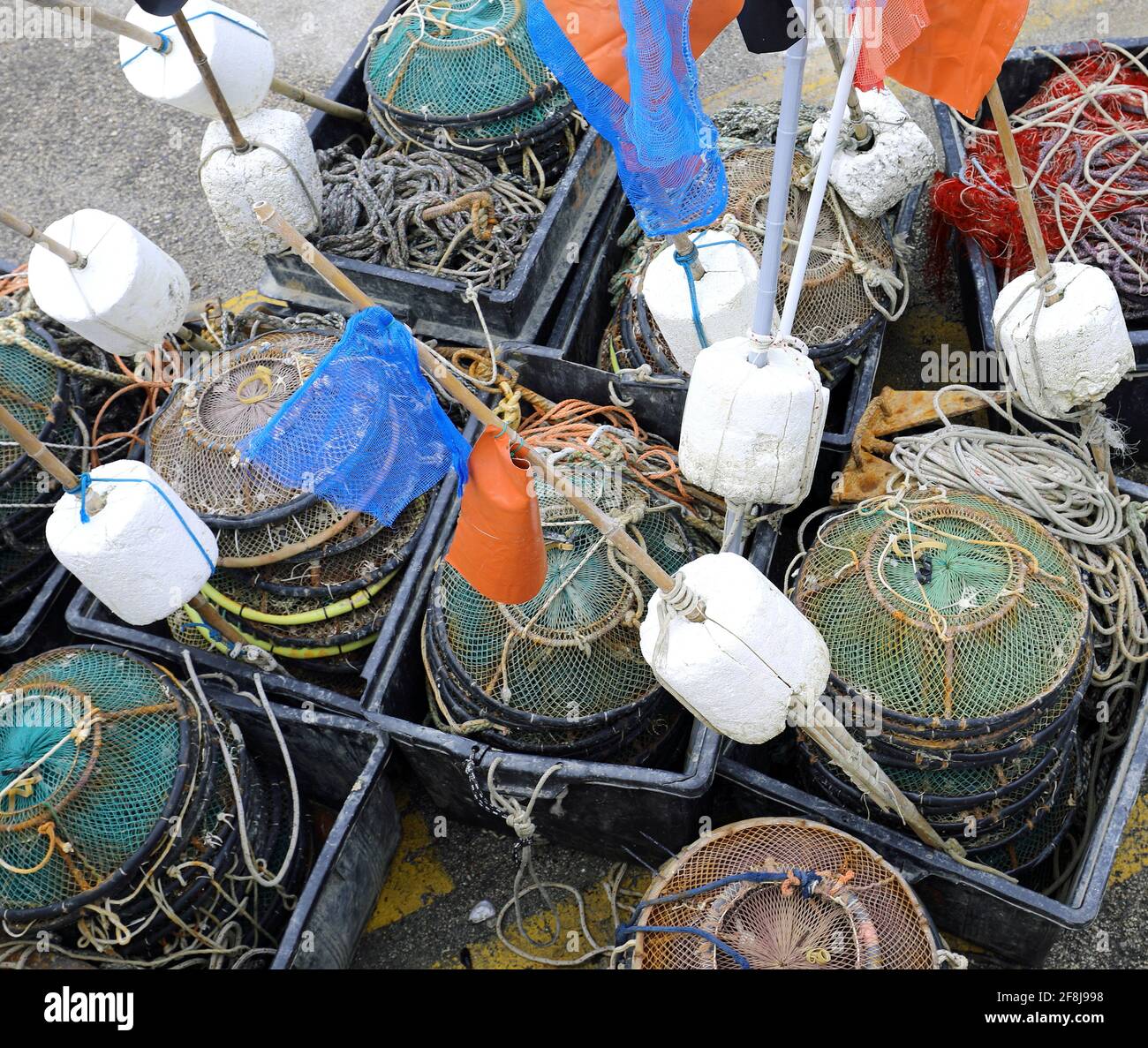 tools and fishnet of fisherman Stock Photo - Alamy