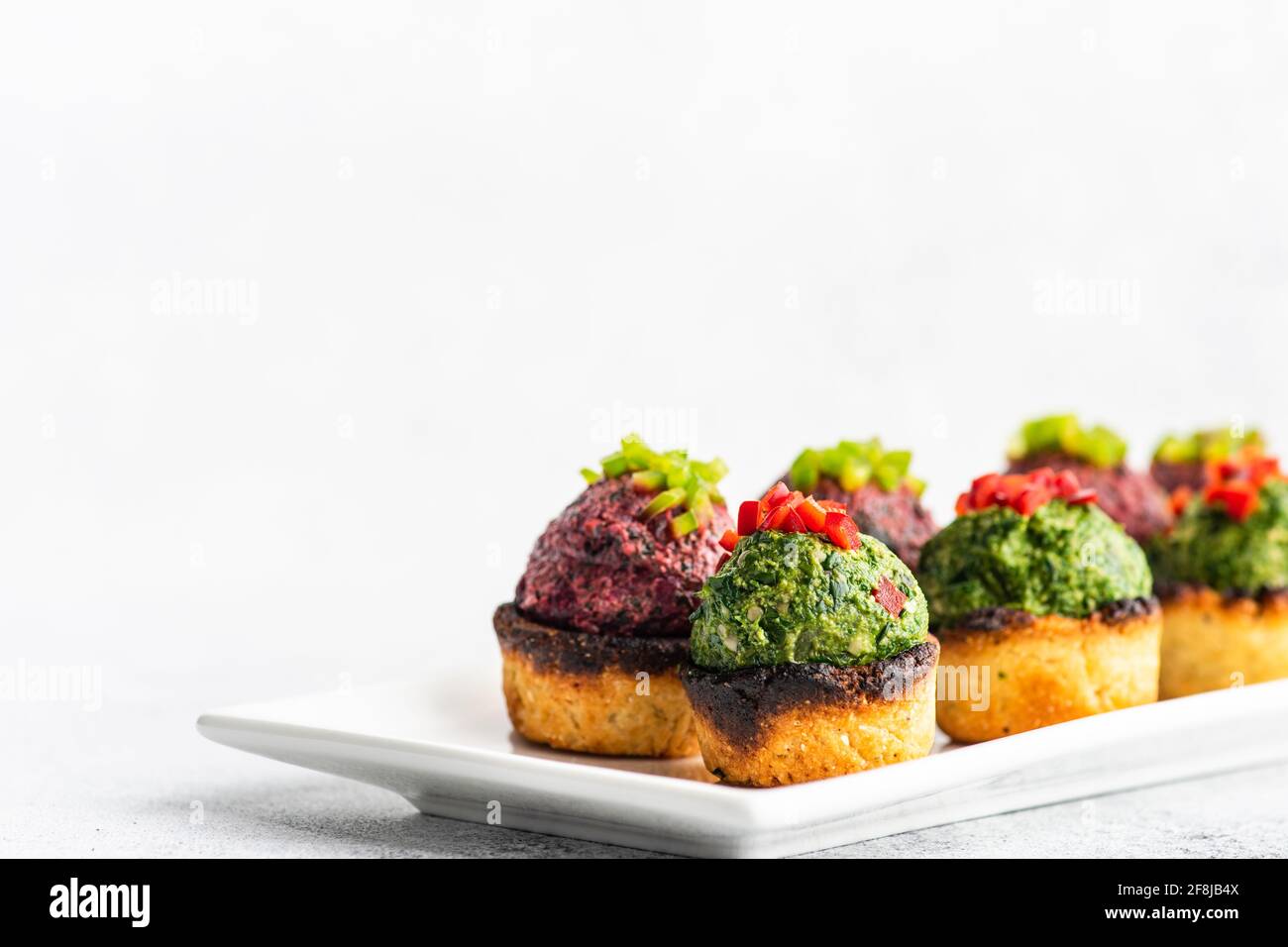 Georgian spinach and beetroot pkhali on mchadi cornbread with bell ...